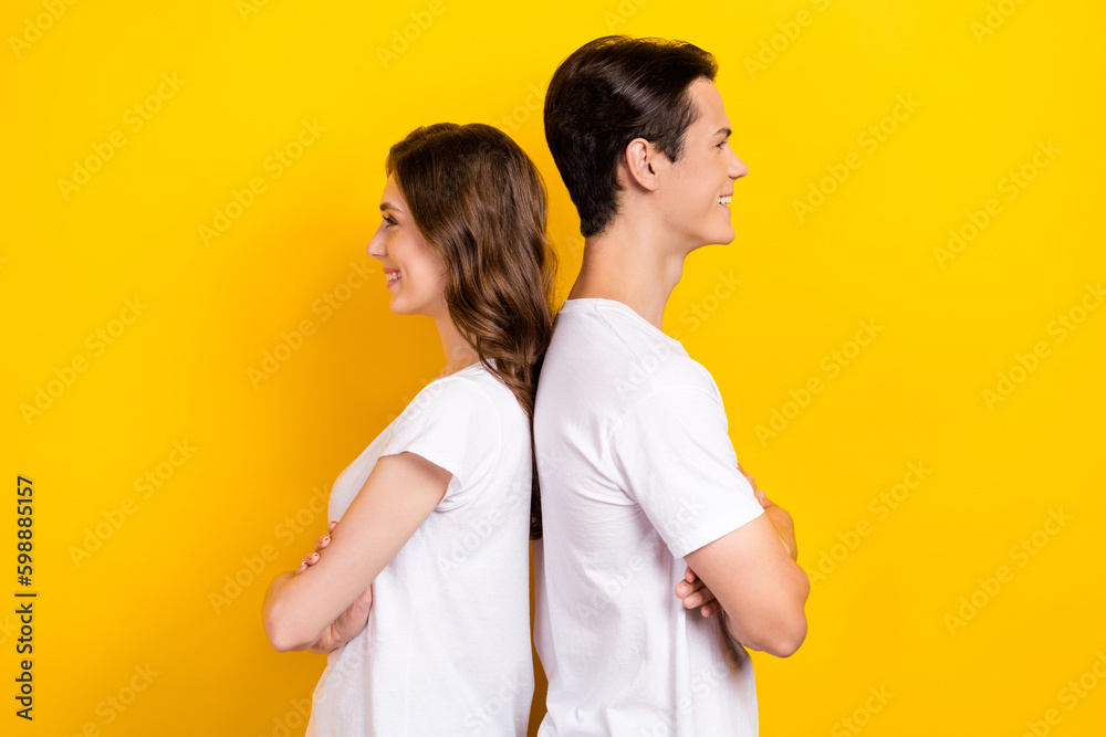 Side profile portrait view of two people smiling partners wear white t ...