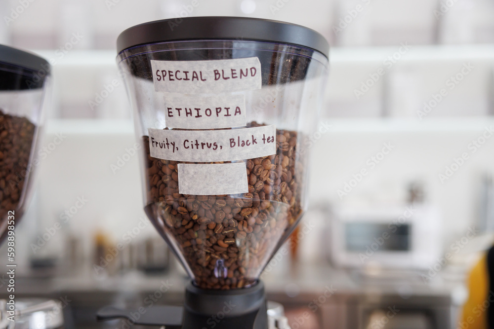ethiopia coffee beans in bean hopper, part of coffee machine in a ...