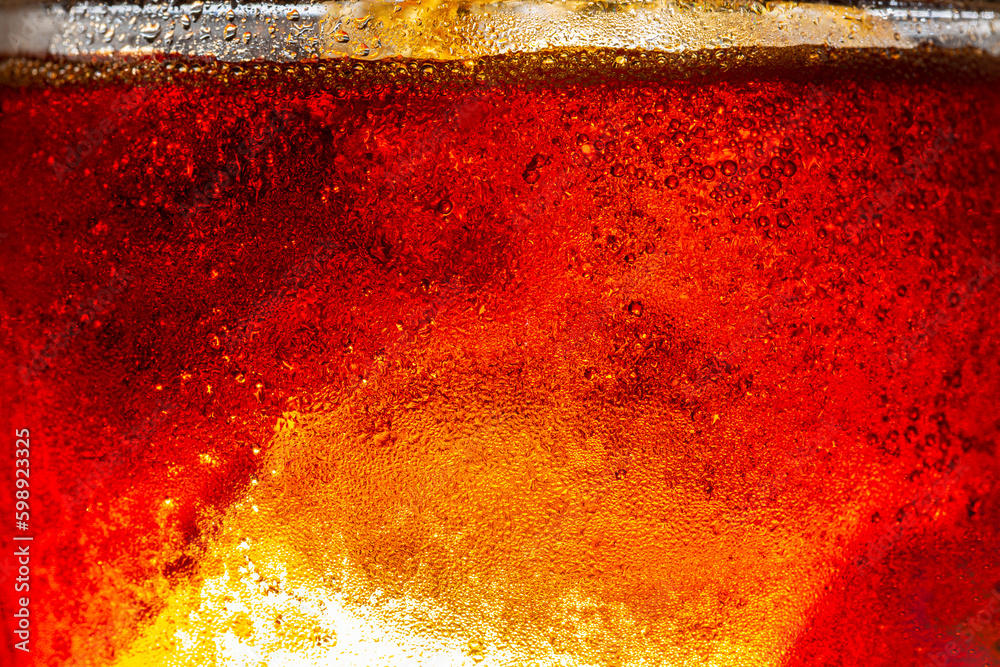 macro cola background,Background of cola with ice and bubbles. Side ...