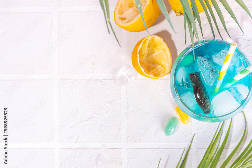 Funny Fish bowl mocktail. Cold blue colored sour lemon Fishbowl ...