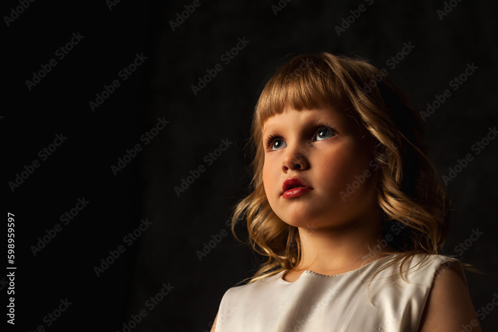 Face of cover baby doll girl 4-5 year old at black background, frozen ...