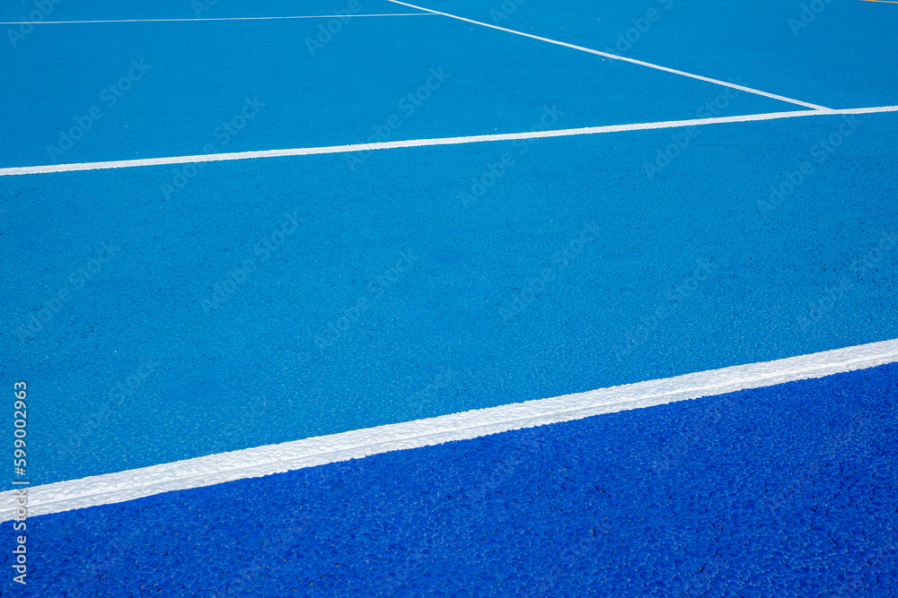 Sport field court background. Blue rubberized and granulated ground ...