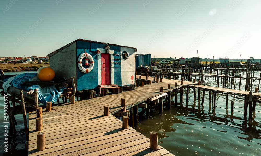 Wooden walkways and huts of the Cais de Palafitas da Carrasqueira.,Palafitico da Carrasqueira ...