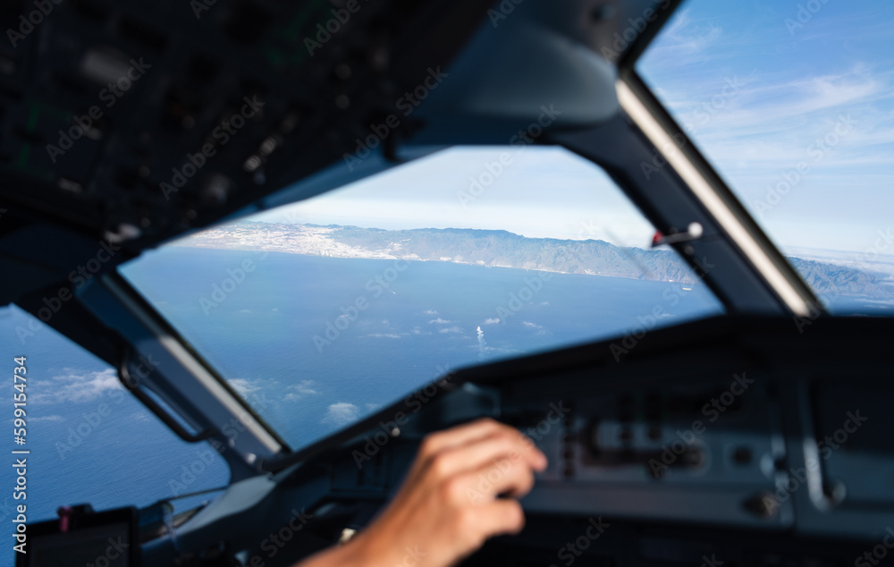 Cockpit view of an aircraft turning in flight Stock Photo | Adobe Stock