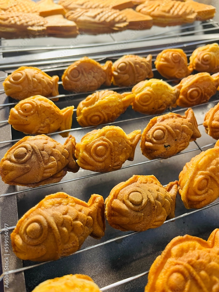 Tiny Taiyaki, a fish-shaped sweet, is Japanese street snack sweets ...