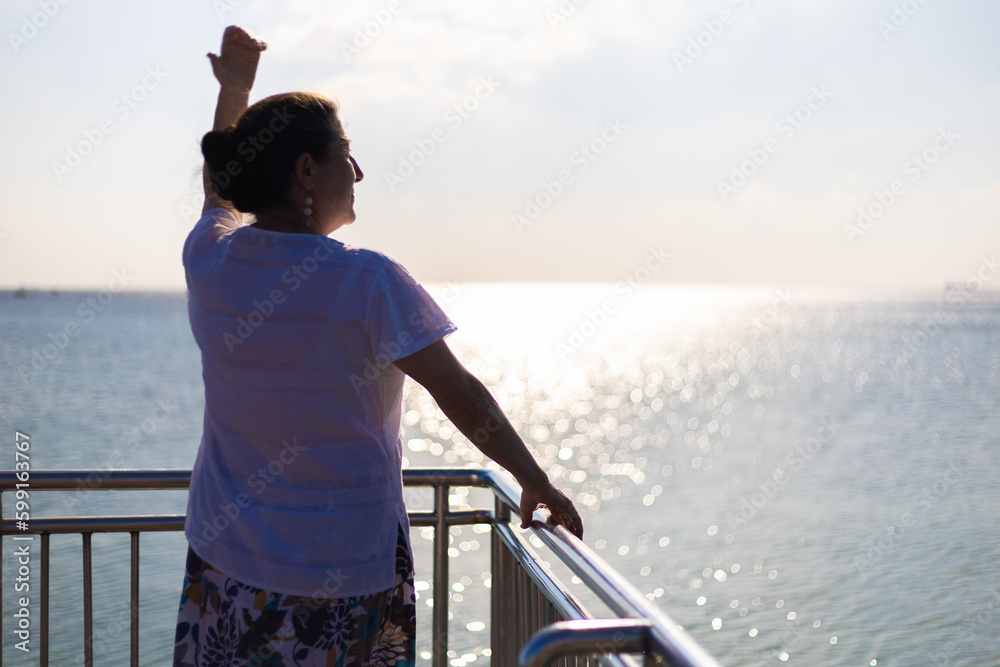 Woman rest on the coast in the city of Istanbul, public places on the ...