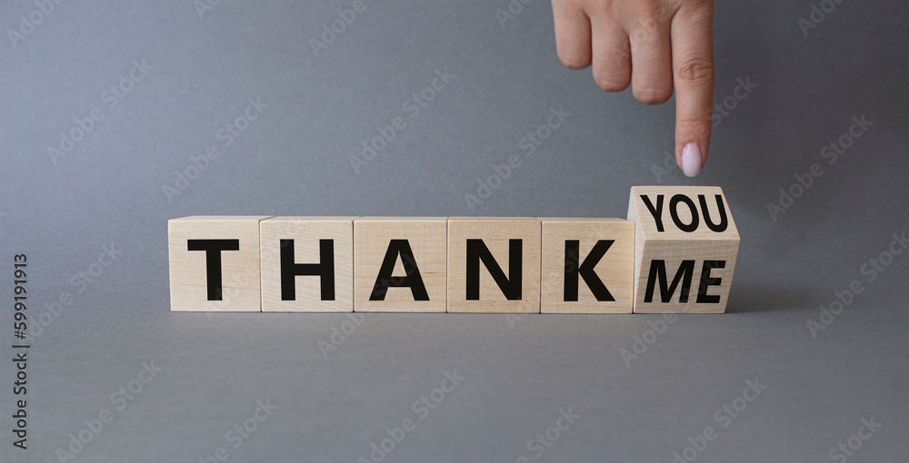 Thank You or Me symbol. Businessman Hand points at wooden cubes with ...