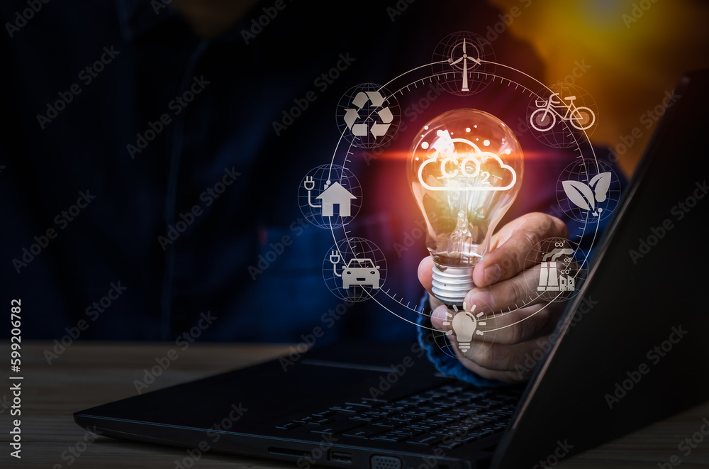 hand holding light bulb concept Show energy interface, CO2 emission reduction concept, global ...