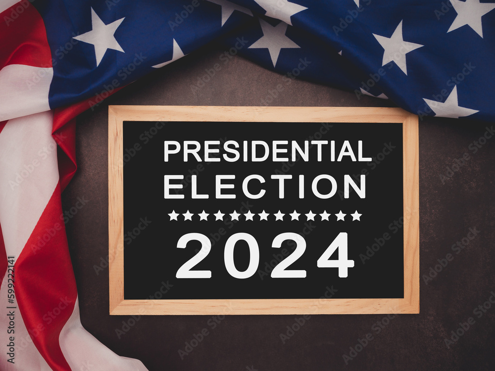 Presidential Election 2024 text on a mini chalkboard over a vintage ...