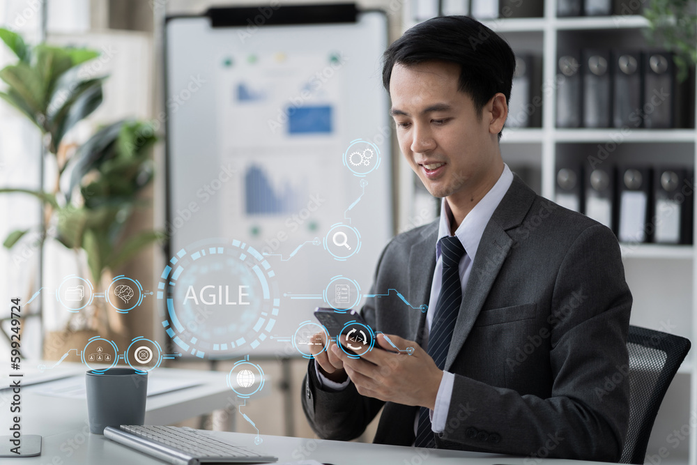 Agile development methodology concept. Business hand using laptop ...