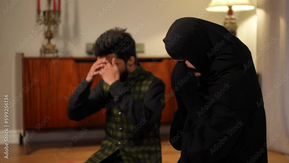 Side view stressed sad Muslim woman in hijab on the right crying as ...