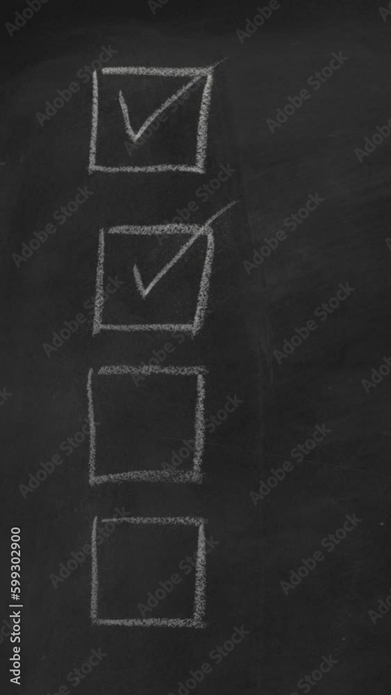 Vertical video. Checklist box. Approve sign. Female hand marking off ...