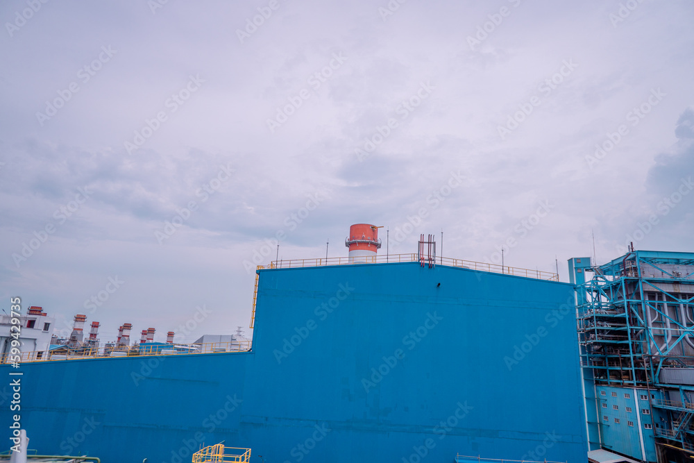 Arial view of power plant project with blue sky and cloudy vibes. The ...