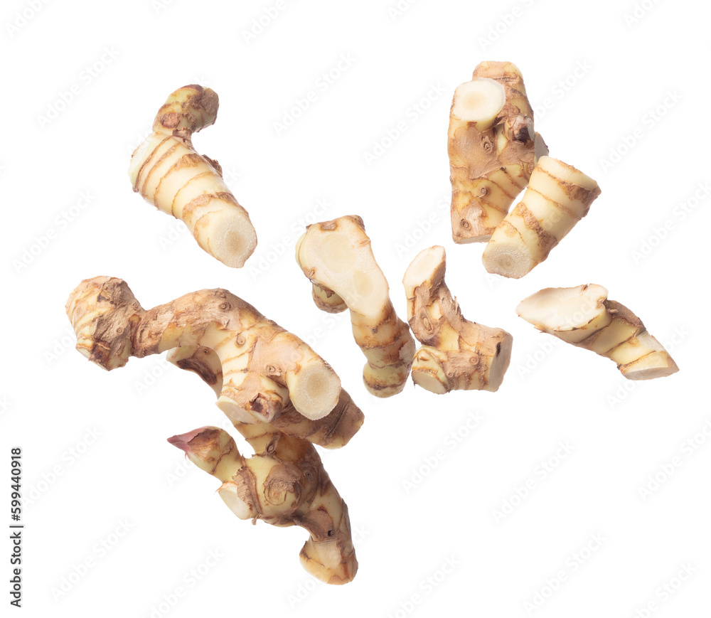 Galangal fly in mid air, fresh vegetable spice galangal falling ...