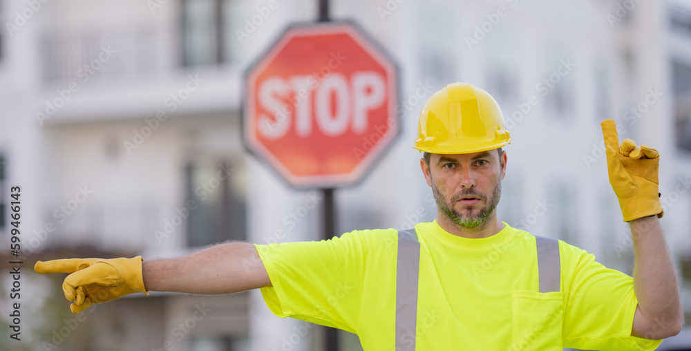 Builder with stop road sign. Builder with stop gesture, no hand ...
