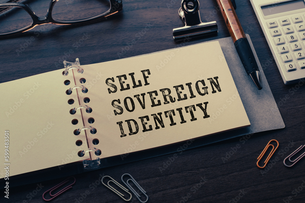 There is notebook with the word Self Sovereign Identity (SSI).It is as ...