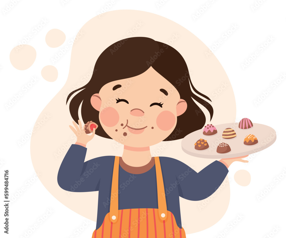 Cute little girl eating chocolate candies. Happy kid eating tasty sweet ...
