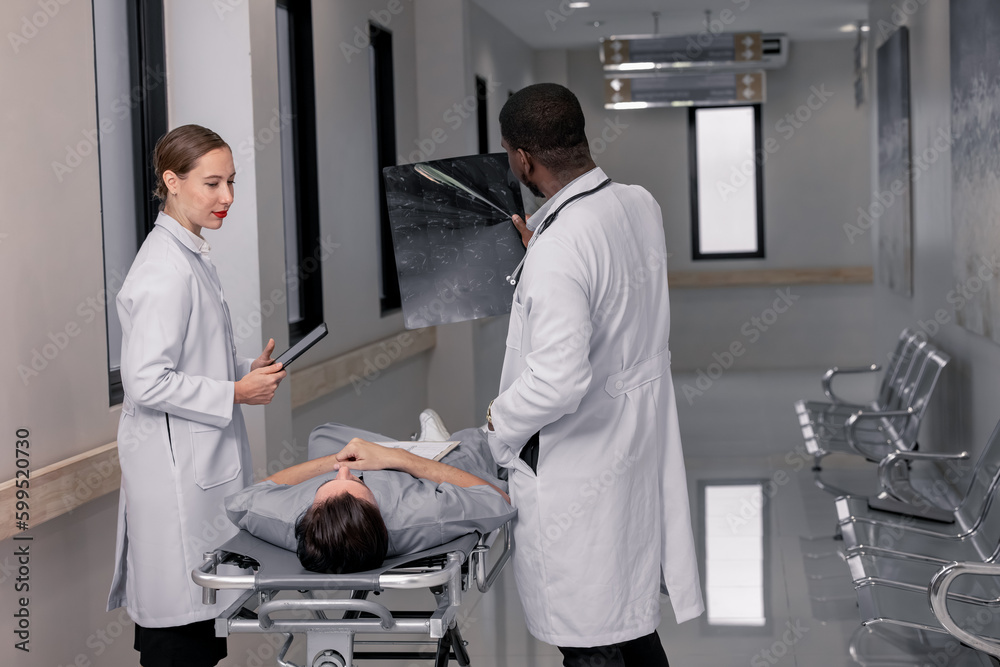 Physician and radiologist analyze medical images, including MRI film ...