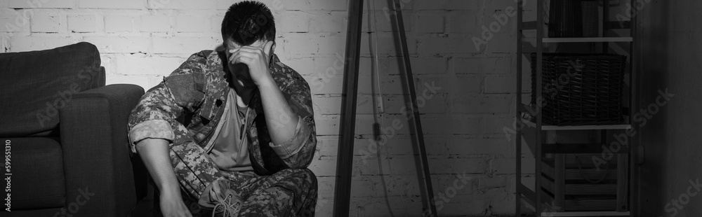 Black and white photo of military veteran suffering from emotional ...