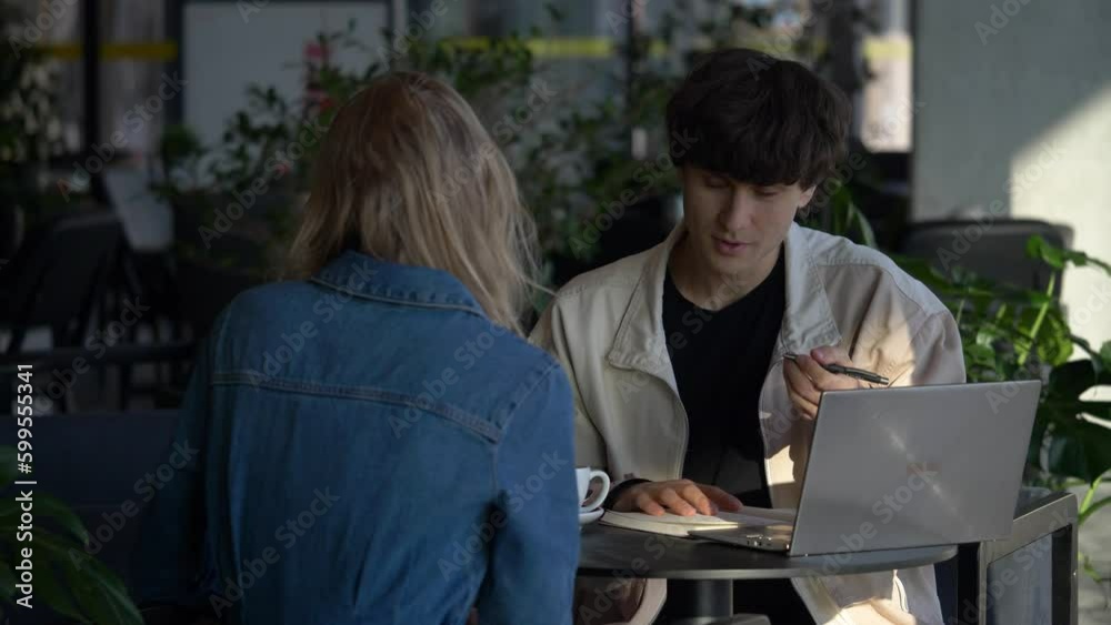 Job interview. Man explains what is the main tasks to do in this ...