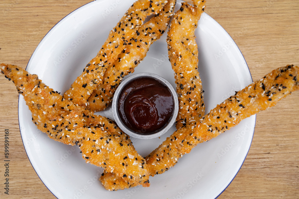 Rustic American food presentation. Top closeup view of fried chicken ...