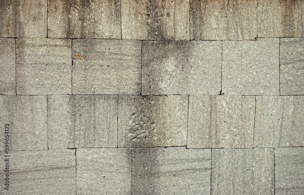 Ancient stone wall background and texture. These stone blocks were used ...