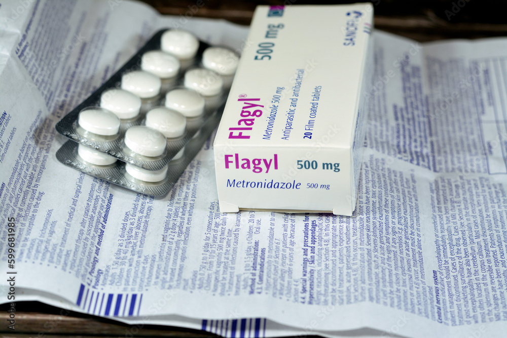 Cairo, Egypt, May 4 2023: Flagyl metronidazole 500mg tablets, Amebicides, an antibiotic that is ...