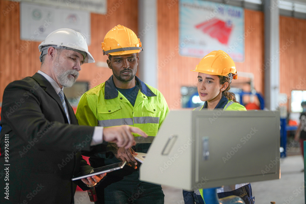 Senior boss manager talking staff engineer assistant woman and African ...