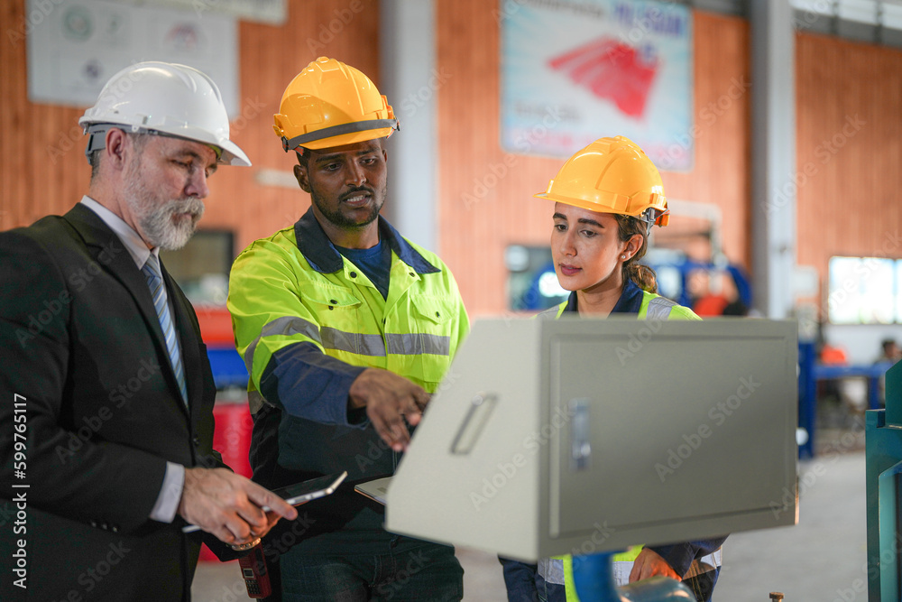 Senior boss manager talking staff engineer assistant woman and African ...