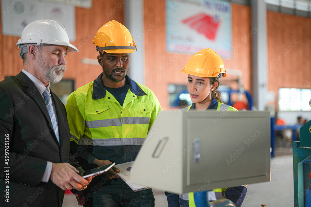 Senior boss manager talking staff engineer assistant woman and African ...