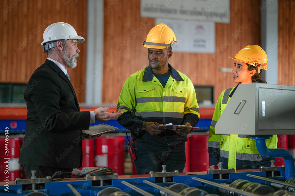 Senior boss manager talking staff engineer assistant woman and African ...