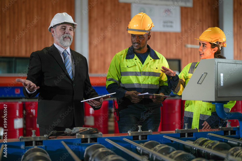 Senior boss manager talking staff engineer assistant woman and African ...