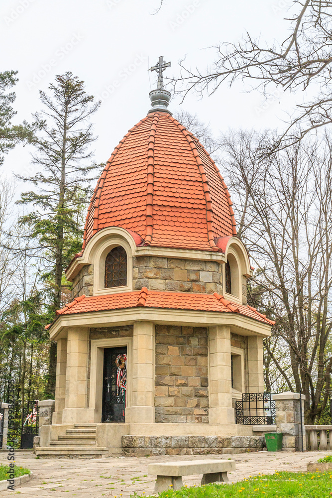 An octagonal mausoleum chapel made of split stone topped with a high ...