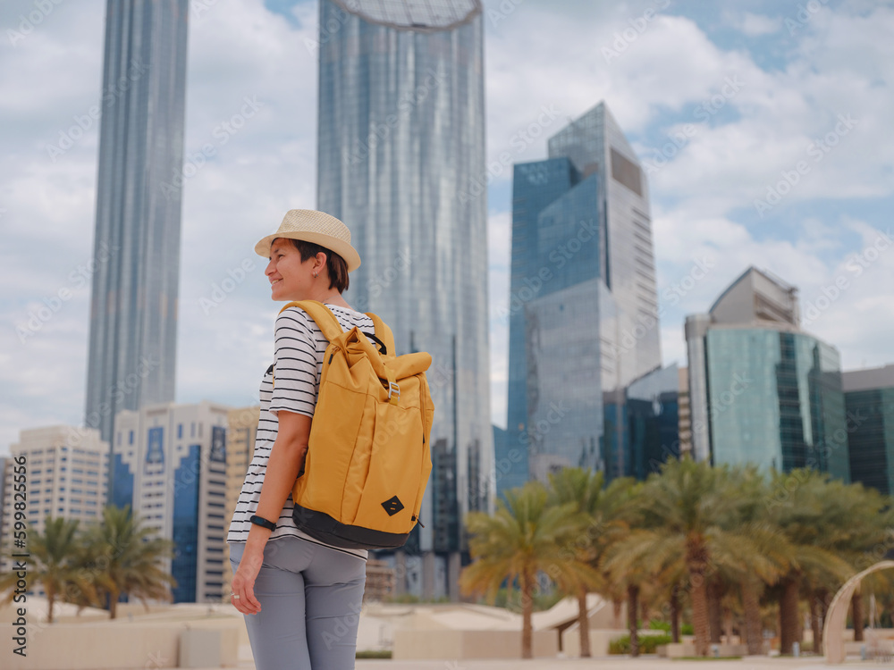 travel to the United Arab Emirates, Happy young asian female traveler ...