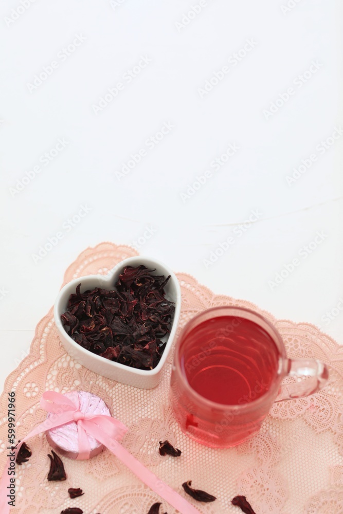 Karkade, a sour-tasting drink, bright red tea, made from dried rosella ...