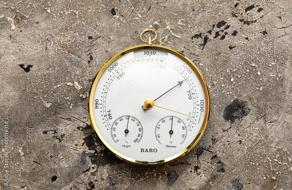Aneroid barometer on grey grunge background Stock Photo | Adobe Stock