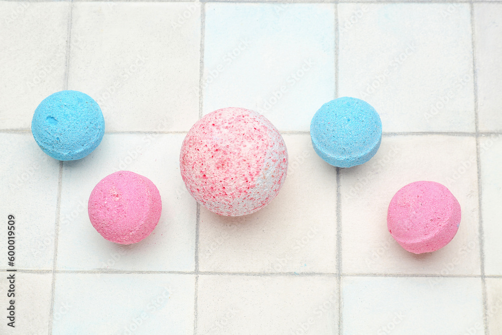 Bath bombs on white tile background Stock Photo | Adobe Stock