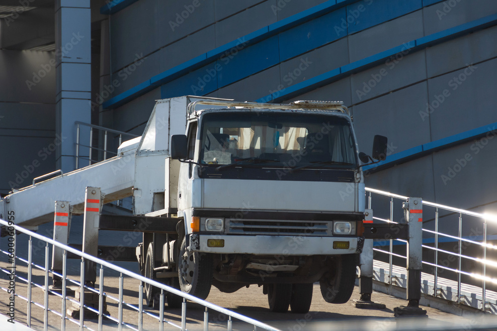 Hydraulics crane support. Small crane truck with outriggers on a ...