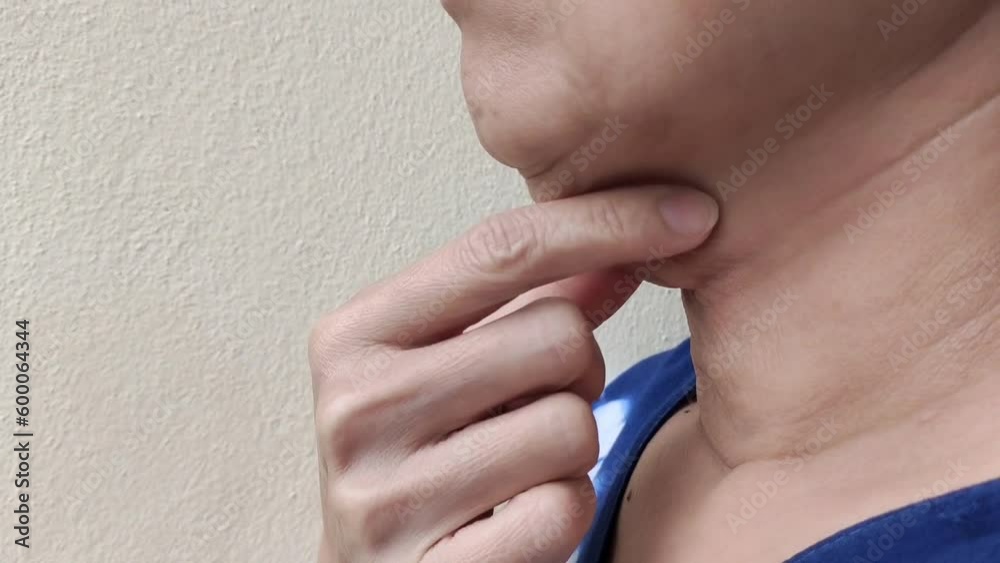 Portrait showing the fingers squeezing the flabbiness adipose sagging ...