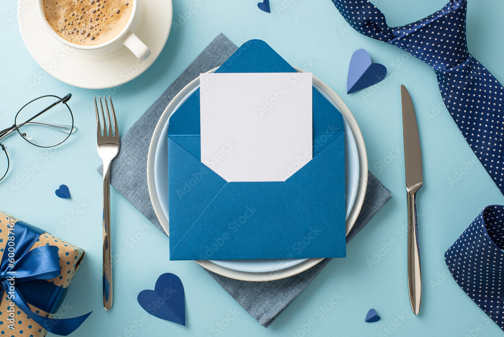 Impress your dad on Father's Day with table setting. Top view envelope ...