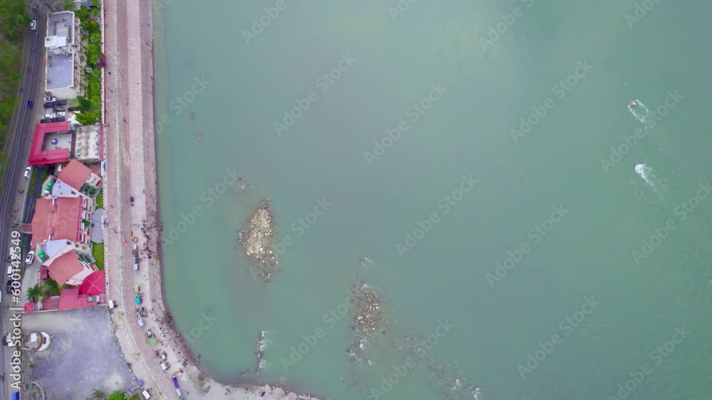 Vidéo Stock pan up aerial drone shot going from car parking, stairs on ...