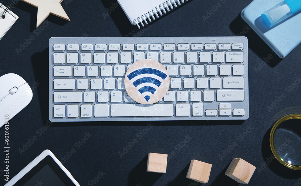 Computer keyboard with a Wireless technology symbol. WiFi symbol with a ...