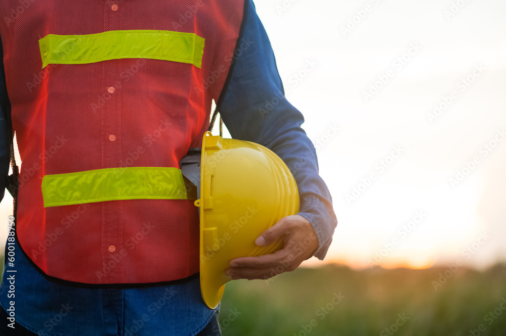 Engineer holding hard hat construction worker professional safety work ...