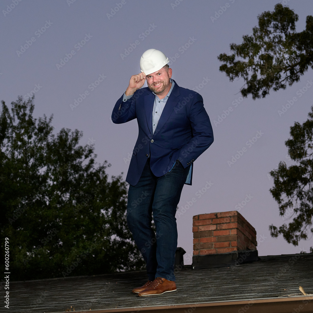 SPRING, TEXAS - SEPTEMBER 30th 2022: a contractor is posing in a suit ...