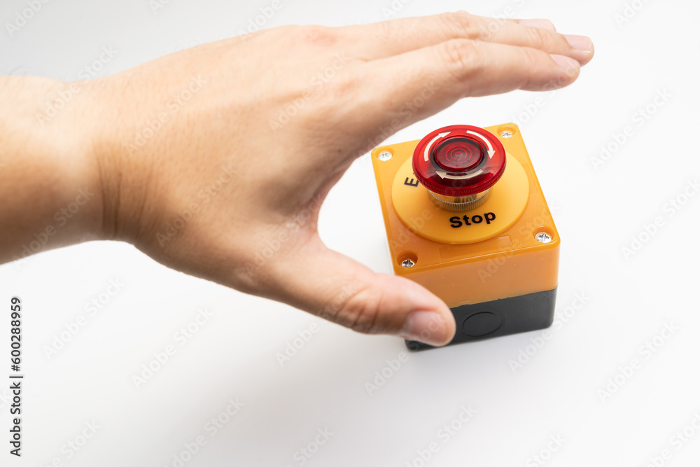 Stop Button and the Hand of Worker About to Press it. emergency stop ...