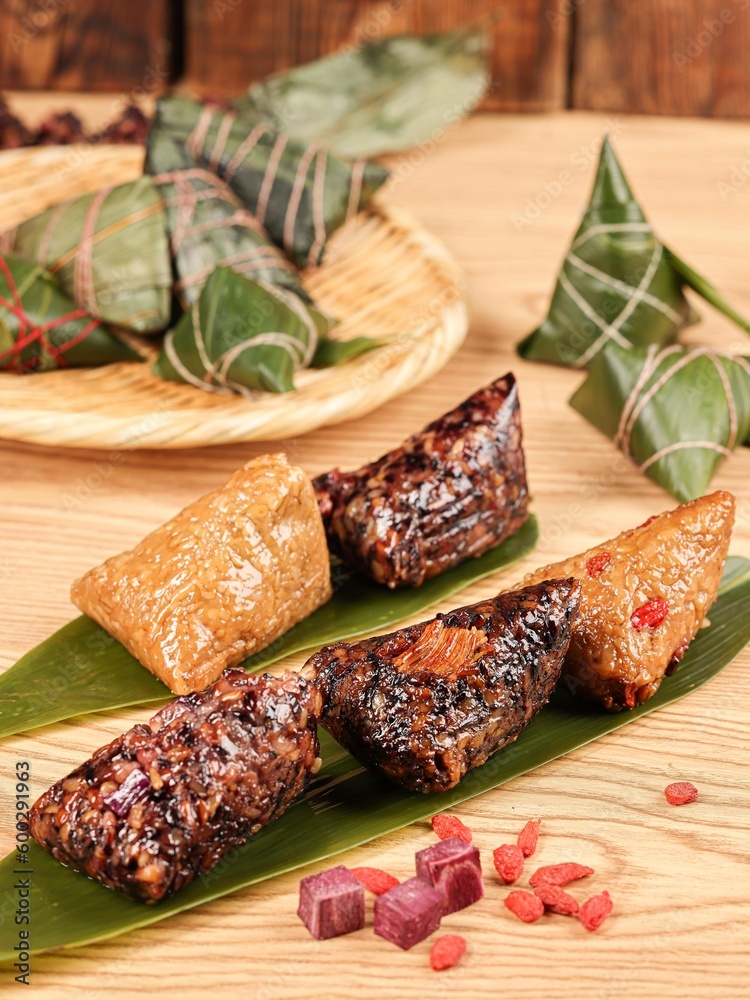 zongzi, rice dumplings,Made with glutinous rice and meat or egg yolk ...