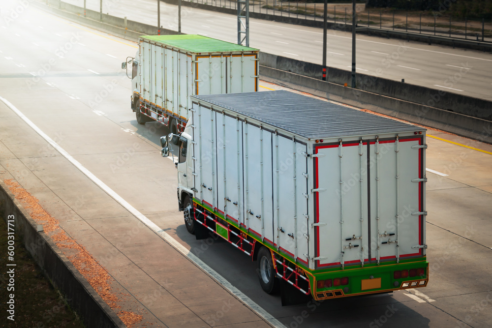 Cargo Truck Driving on Highway Road. Shipping Container Commercial ...