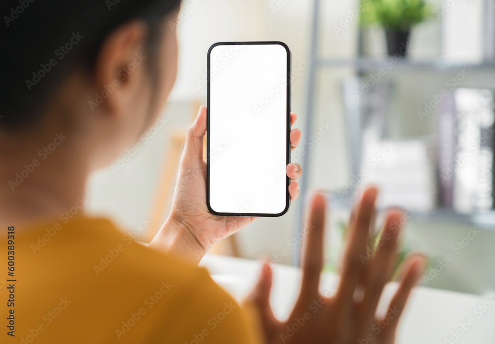 Hand holding smartphone mockup of blank screen. Take your screen to put ...