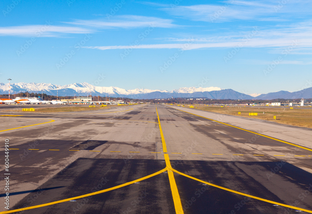 Malpensa Airport runway . Strip ground along aircraft take off and land ...