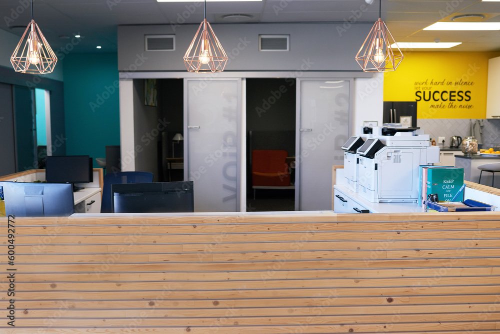 Empty reception desk with wooden front, coworking office space Stock ...